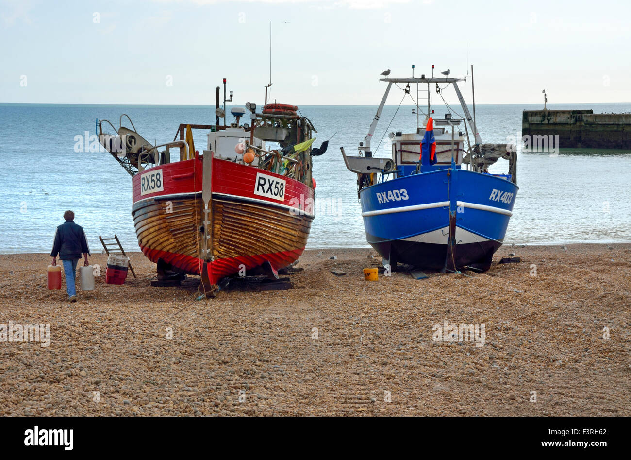 Hastings, East Sussex, England, UK. Fishing boats on the shingle beach ...