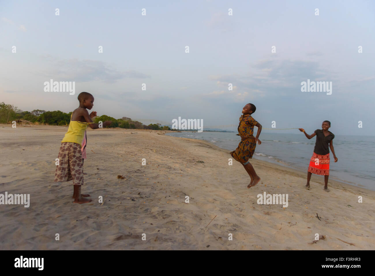 Native children jumping water hi-res stock photography and images - Alamy