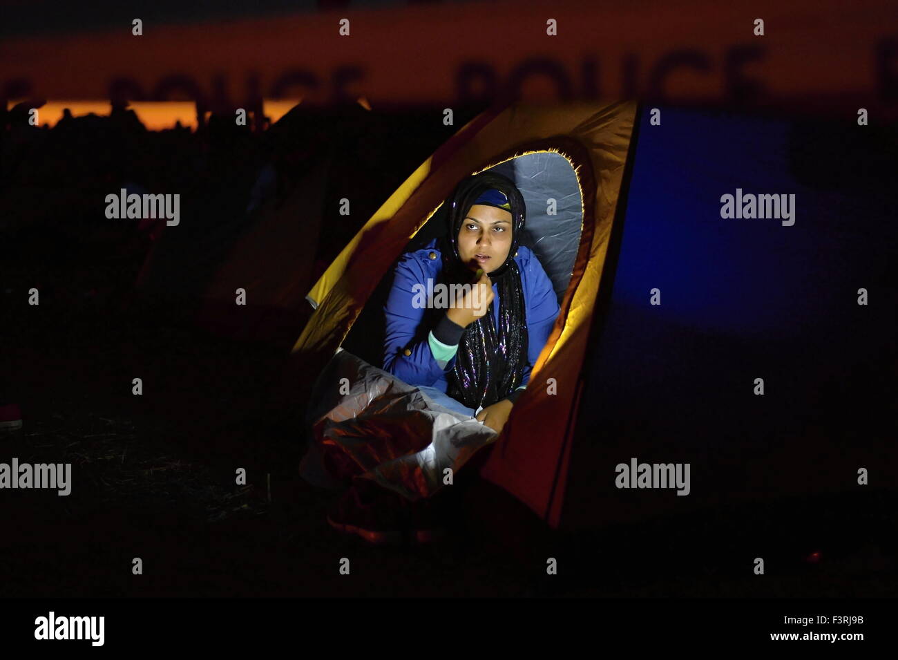 Roszke, Hungary. 06th Sep, 2015. Migrants at a temporary holding camp ...