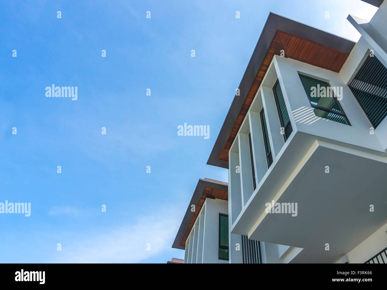Modern Resident House with blue skies background Stock Photo - Alamy