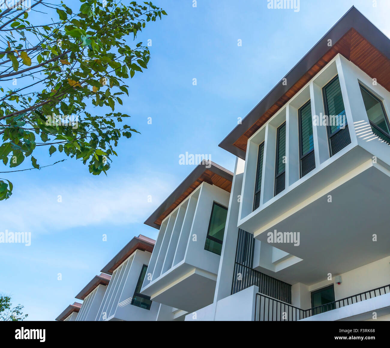 Modern Resident House with blue skies background Stock Photo - Alamy