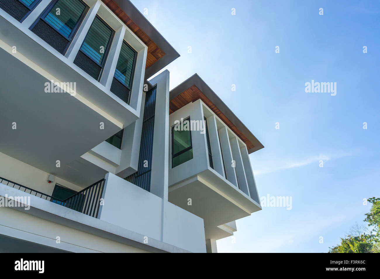 Modern Resident House with blue skies background Stock Photo - Alamy