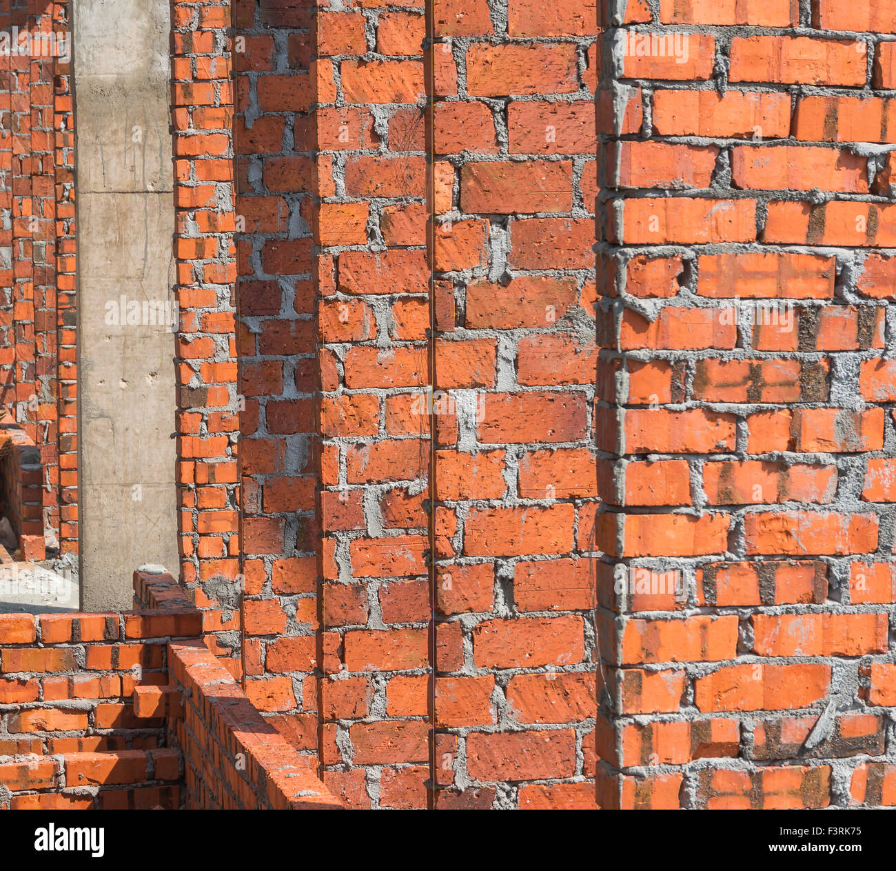 Brickwall at construction building Stock Photo - Alamy
