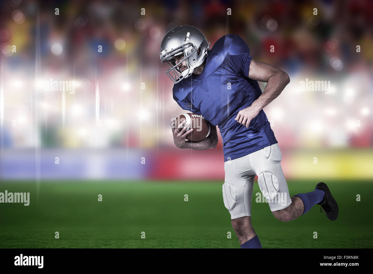 Composite image of american football player holding ball in mid-air ...
