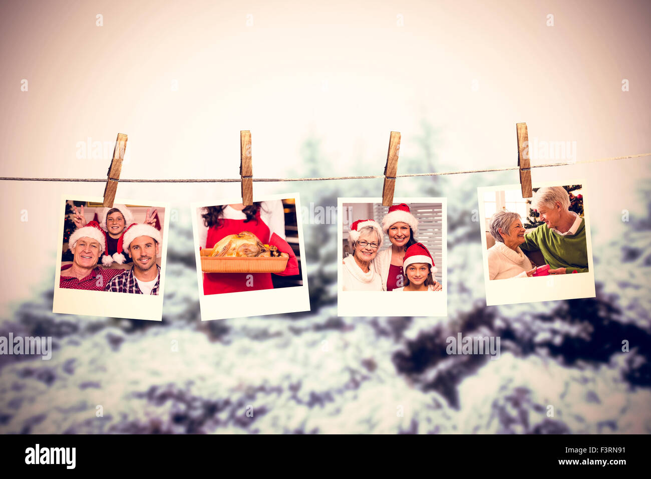 Composite image of clothes peg on line with instant photos Stock Photo ...