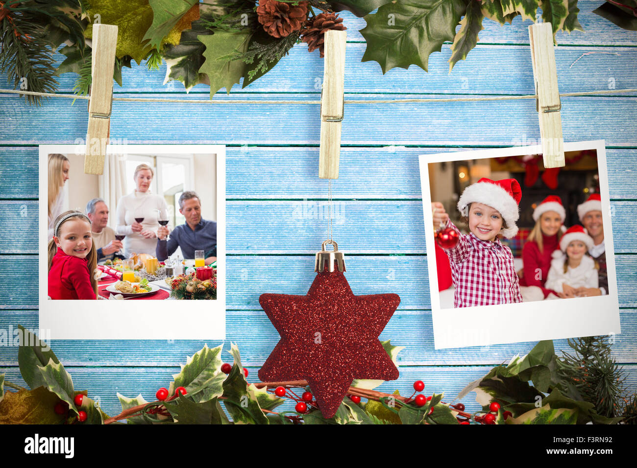 Composite image of hanging christmas photos Stock Photo - Alamy