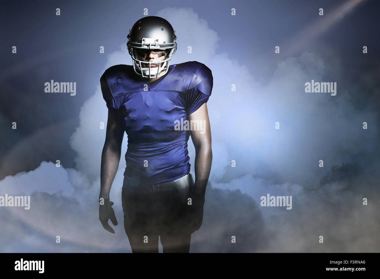 Composite image of american football player standing Stock Photo - Alamy