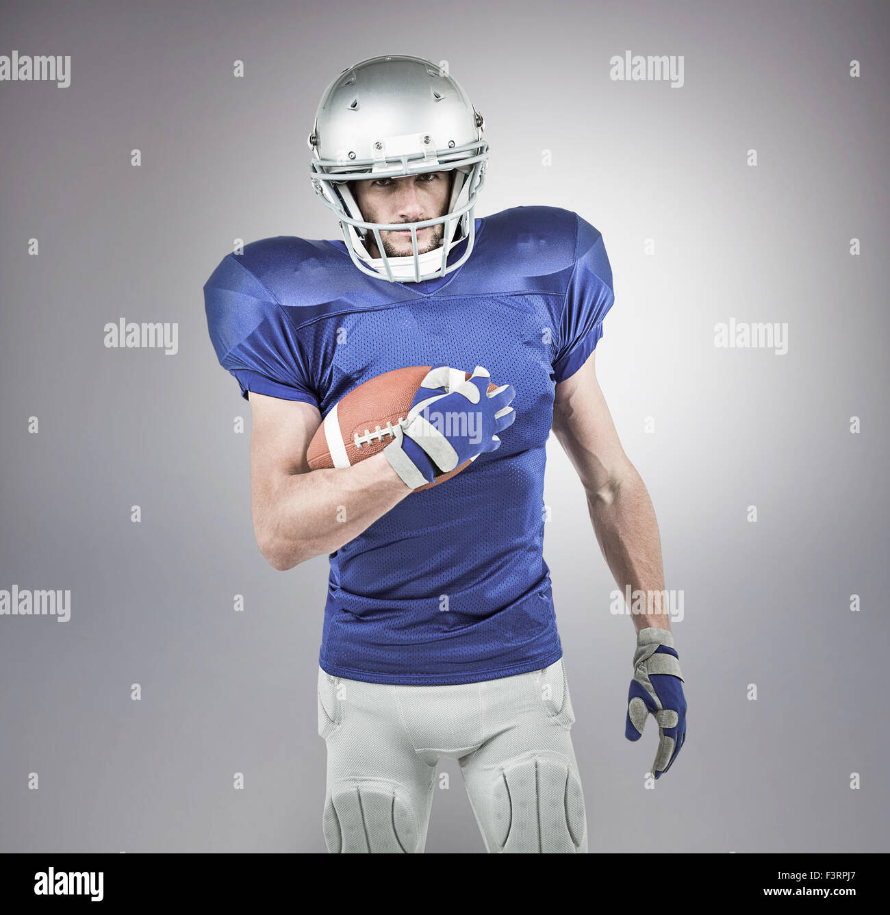 Composite image of portrait of confident american football player ...