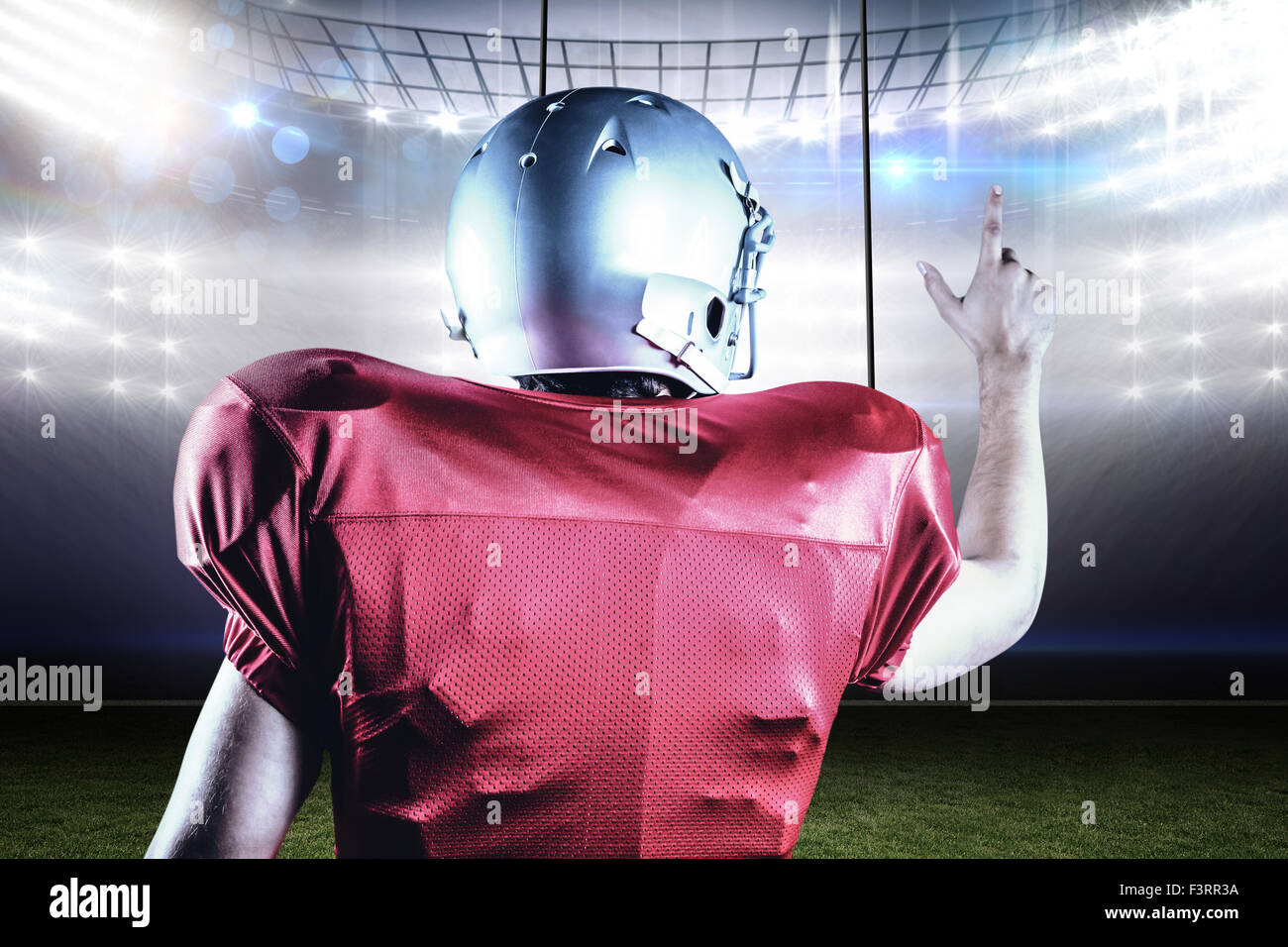 Composite image of rear view of american football player pointing Stock ...