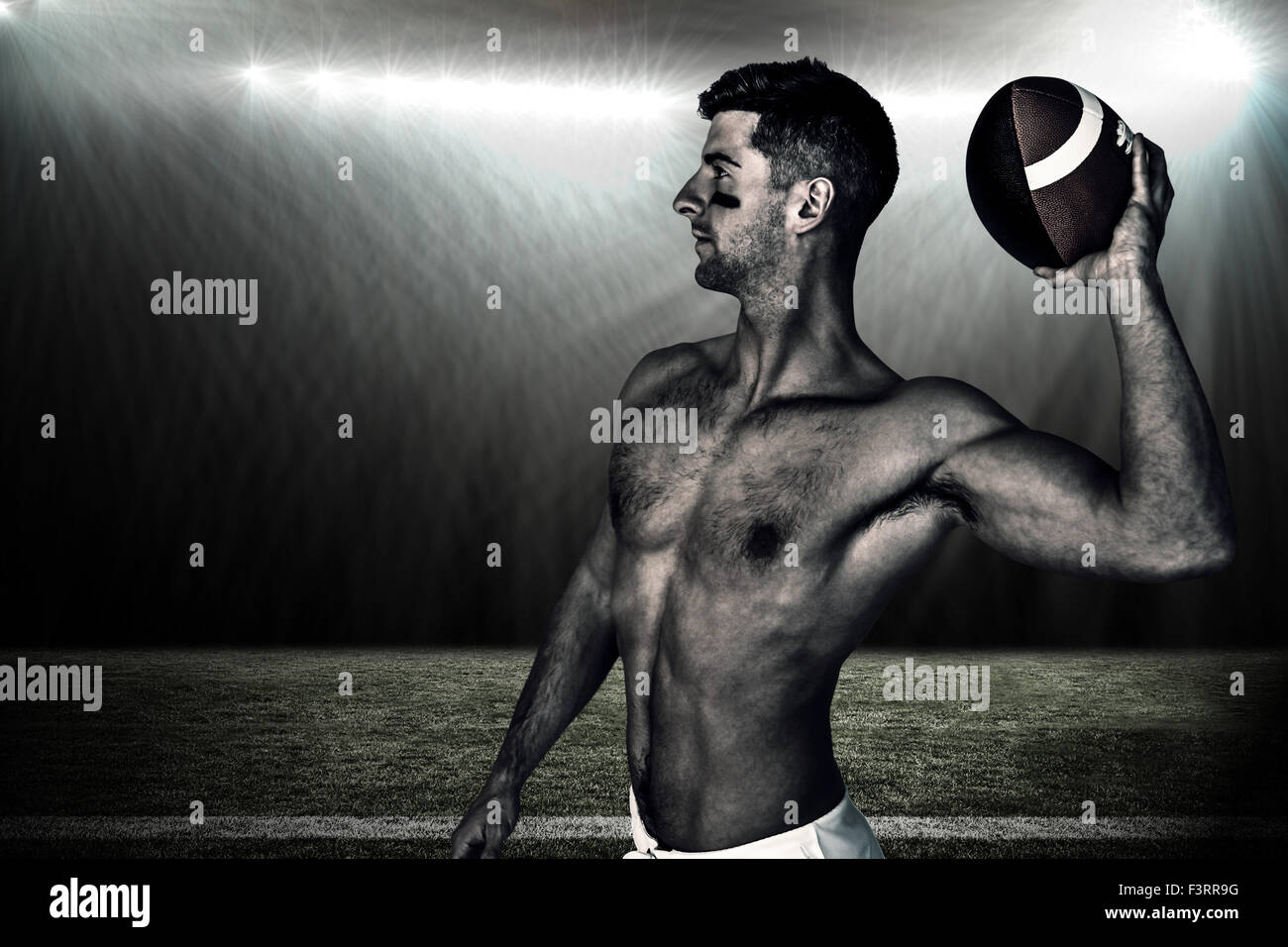 Composite image of shirtless rugby player ready to throw the ball Stock ...
