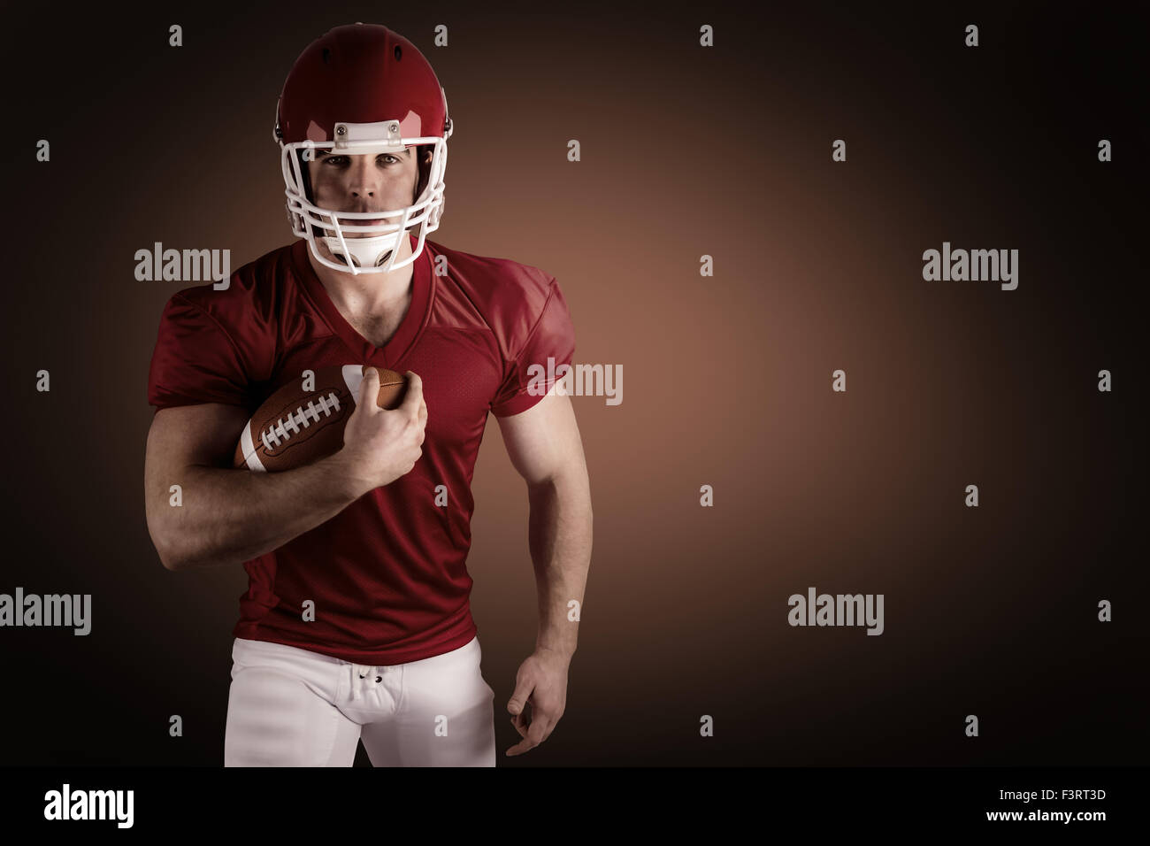 Muscular man football ball hi-res stock photography and images - Alamy