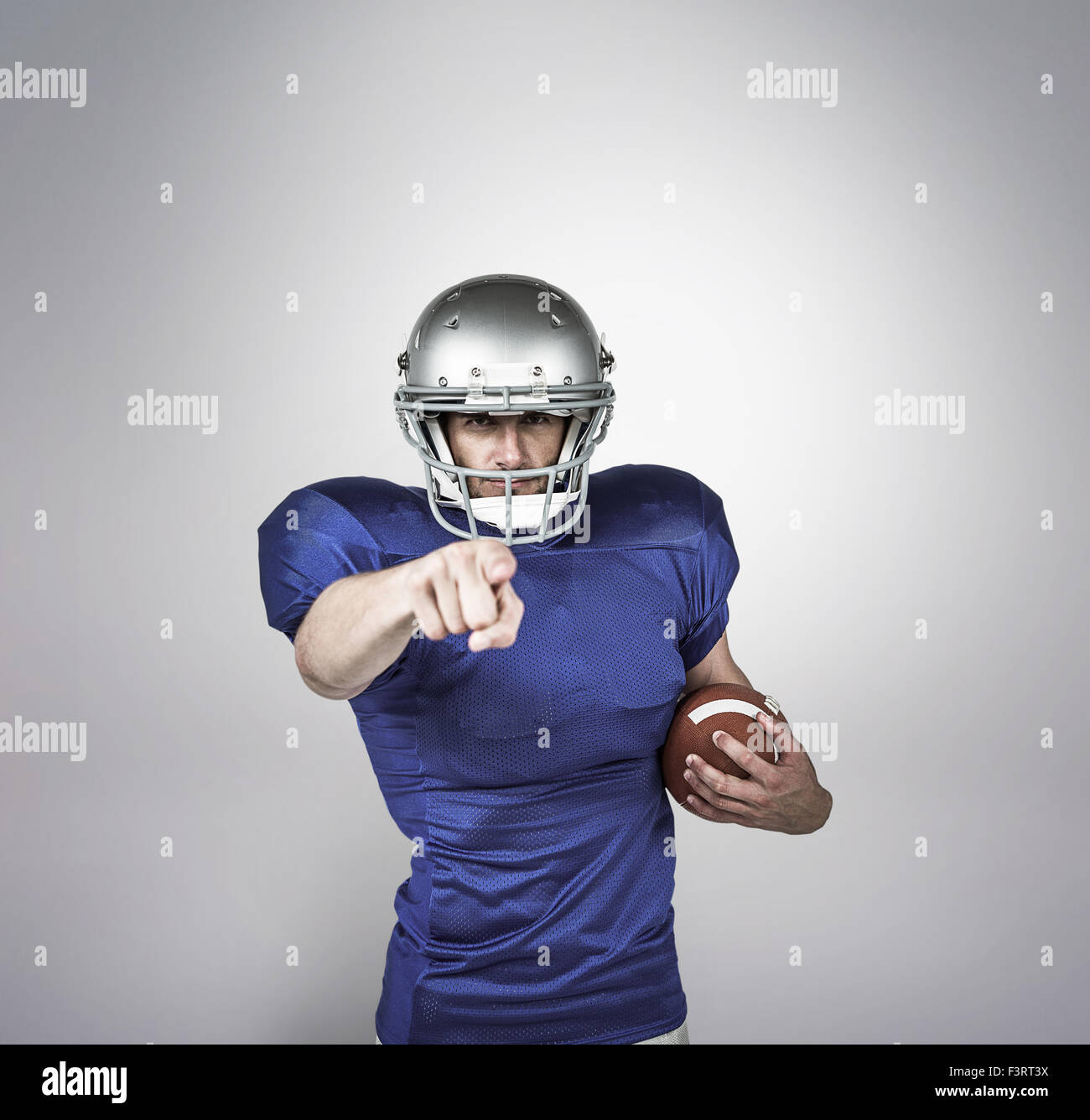 Composite image of portrait sports player pointing Stock Photo - Alamy
