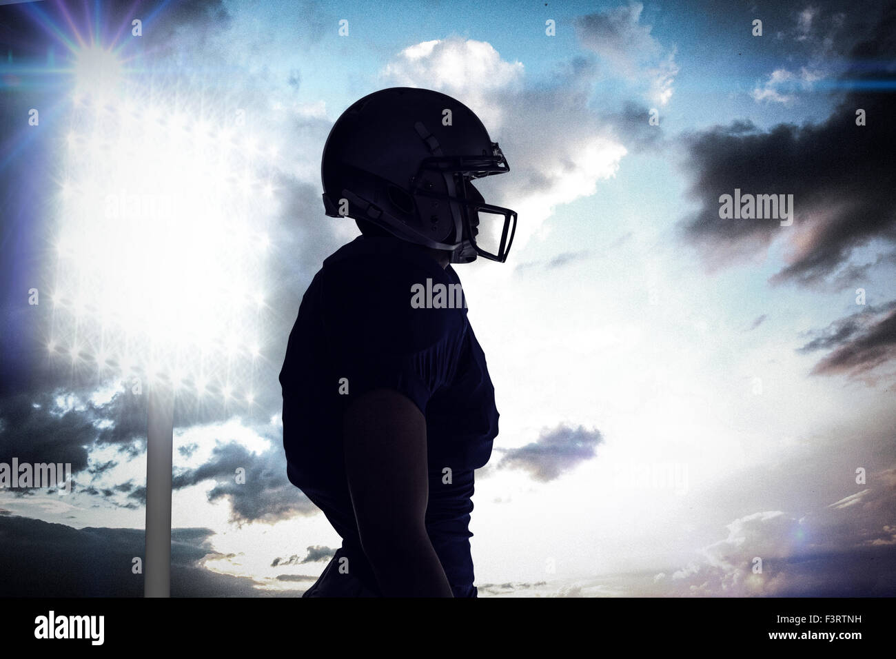Composite image of side view of silhouette american football player ...