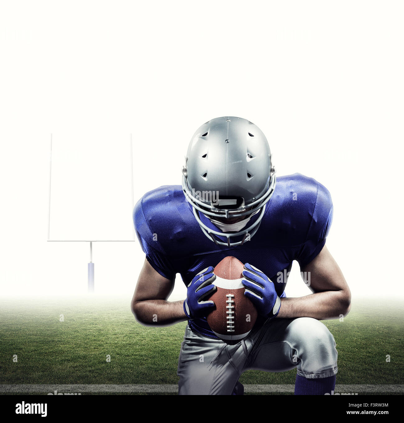 Kneeling football hi-res stock photography and images - Alamy