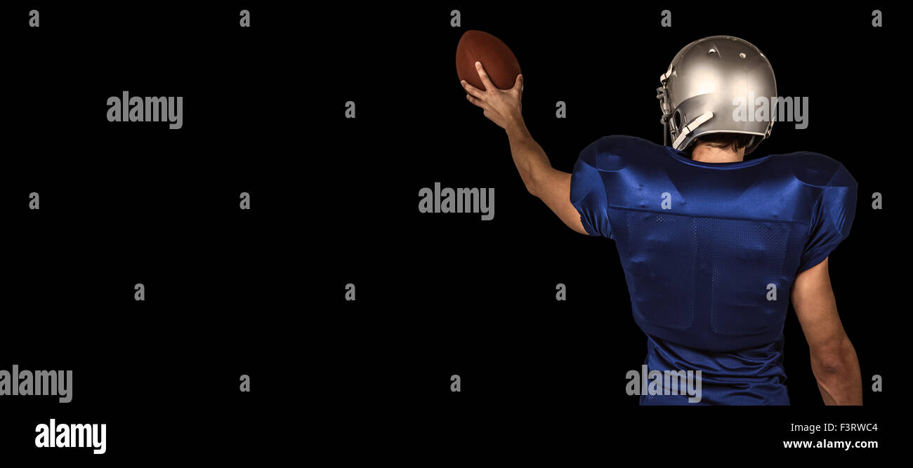 Quarterback holding ball hi-res stock photography and images - Alamy