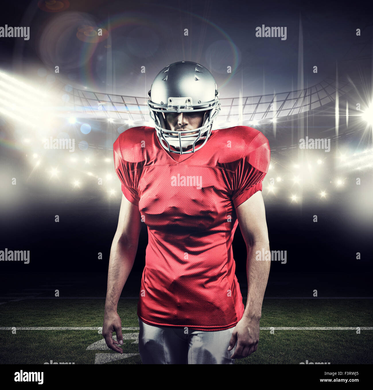 Composite image of confident american football player Stock Photo - Alamy