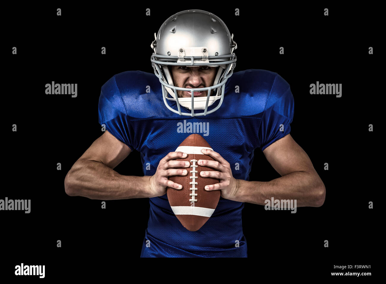 Composite image of portrait of aggressive american football player ...