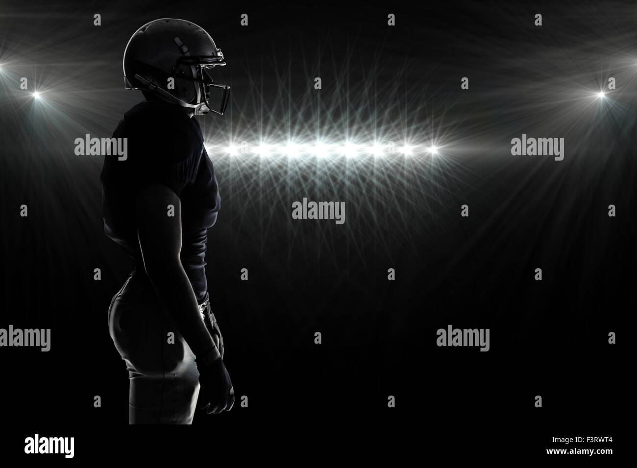 Composite image of side view of silhouette american football player ...