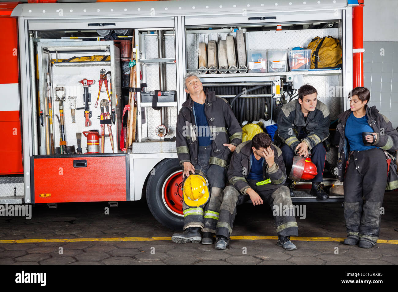 Tired firefighters hi-res stock photography and images - Alamy