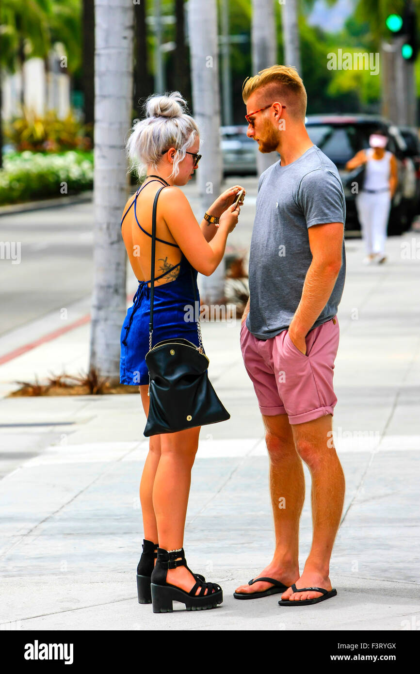 Trendy young people hanging out on Rodeo Drive in Beverly Hills in ...