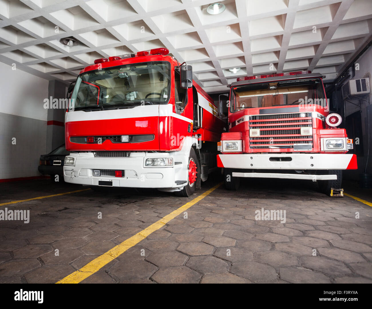 Fire Engines In Station Stock Photo - Alamy