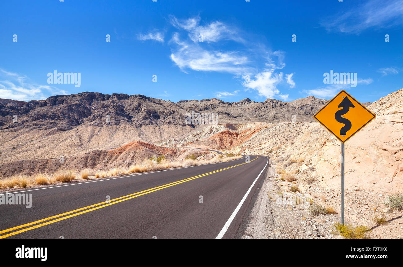 Country road and winding road sign, USA Stock Photo - Alamy