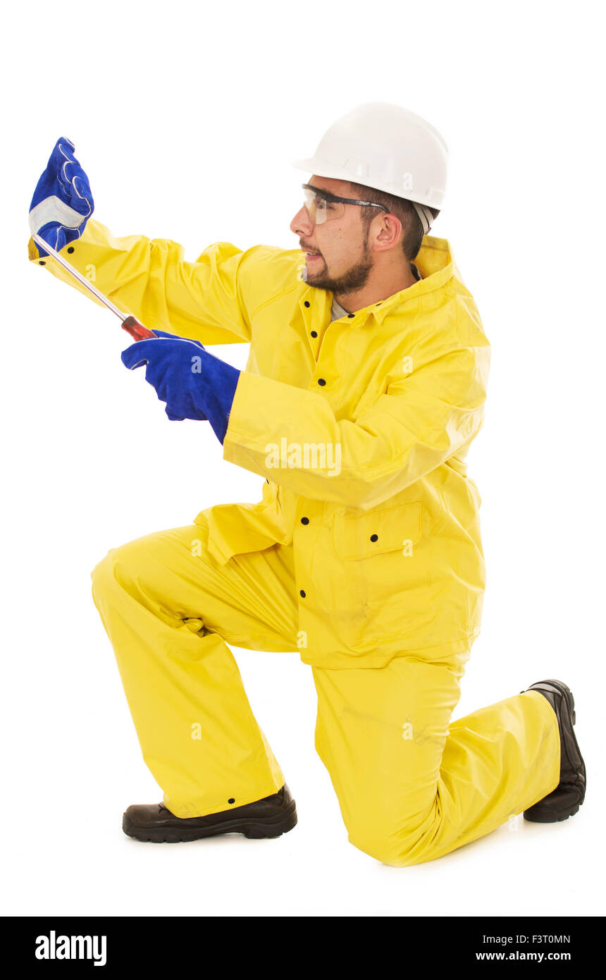 man with screwdriver protective suit Stock Photo - Alamy