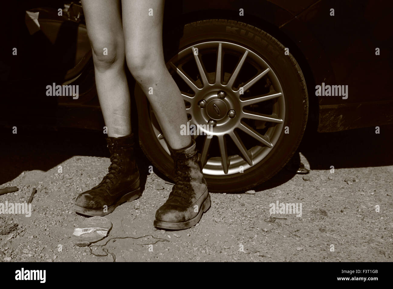 A female punk rocker wears combat boots during the 2012 Plan-It-X Fest ...