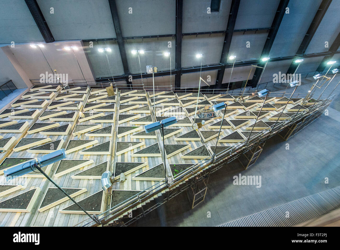 London, UK. 12th October, 2015. The earth filled troughs will be ...