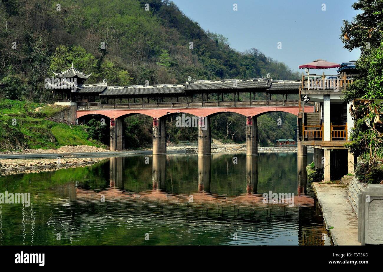 Jie Zi Ancient Town, China: Dragon Bridge spans crystal clear river ...