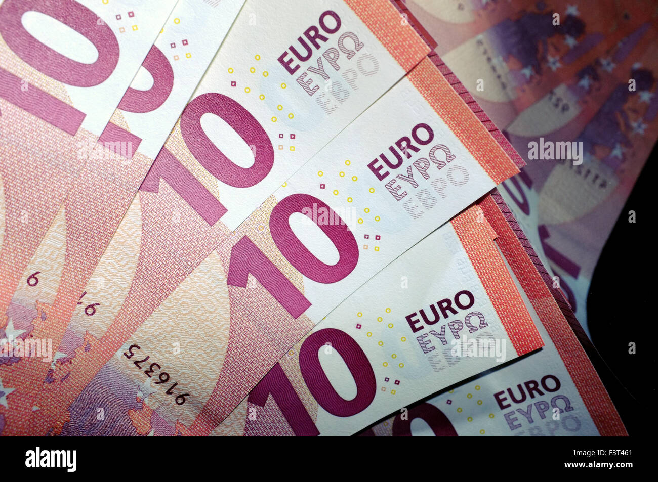 Stashing euros hi-res stock photography and images - Alamy