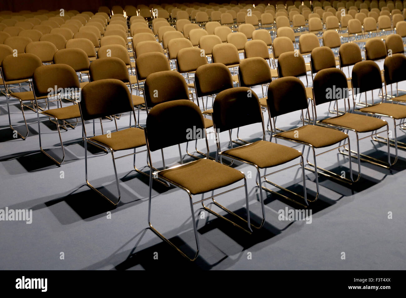 Rows of empty chairs prepared for an indoor event Stock Photo - Alamy