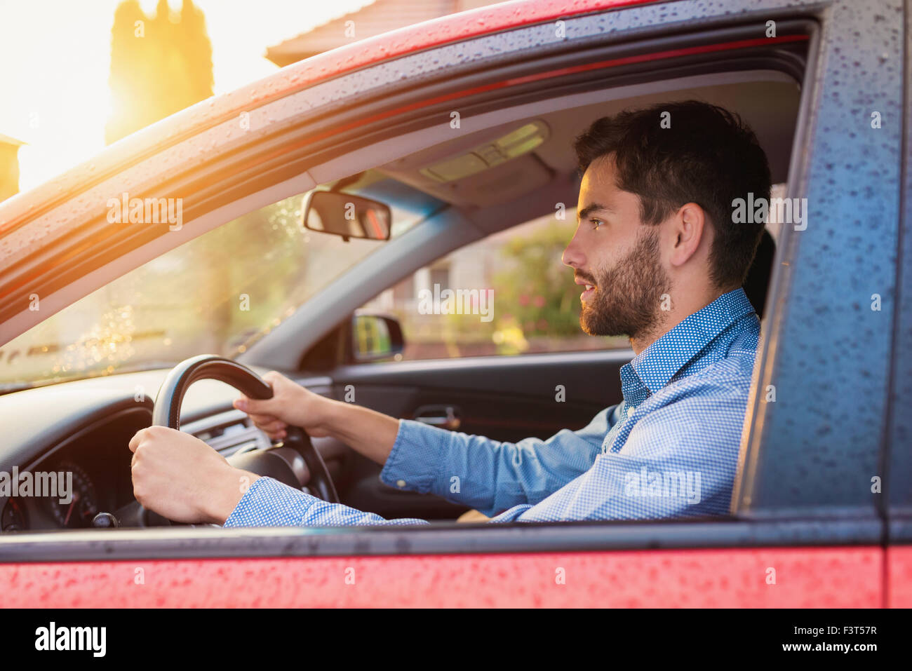 Man driving a car Stock Photo - Alamy