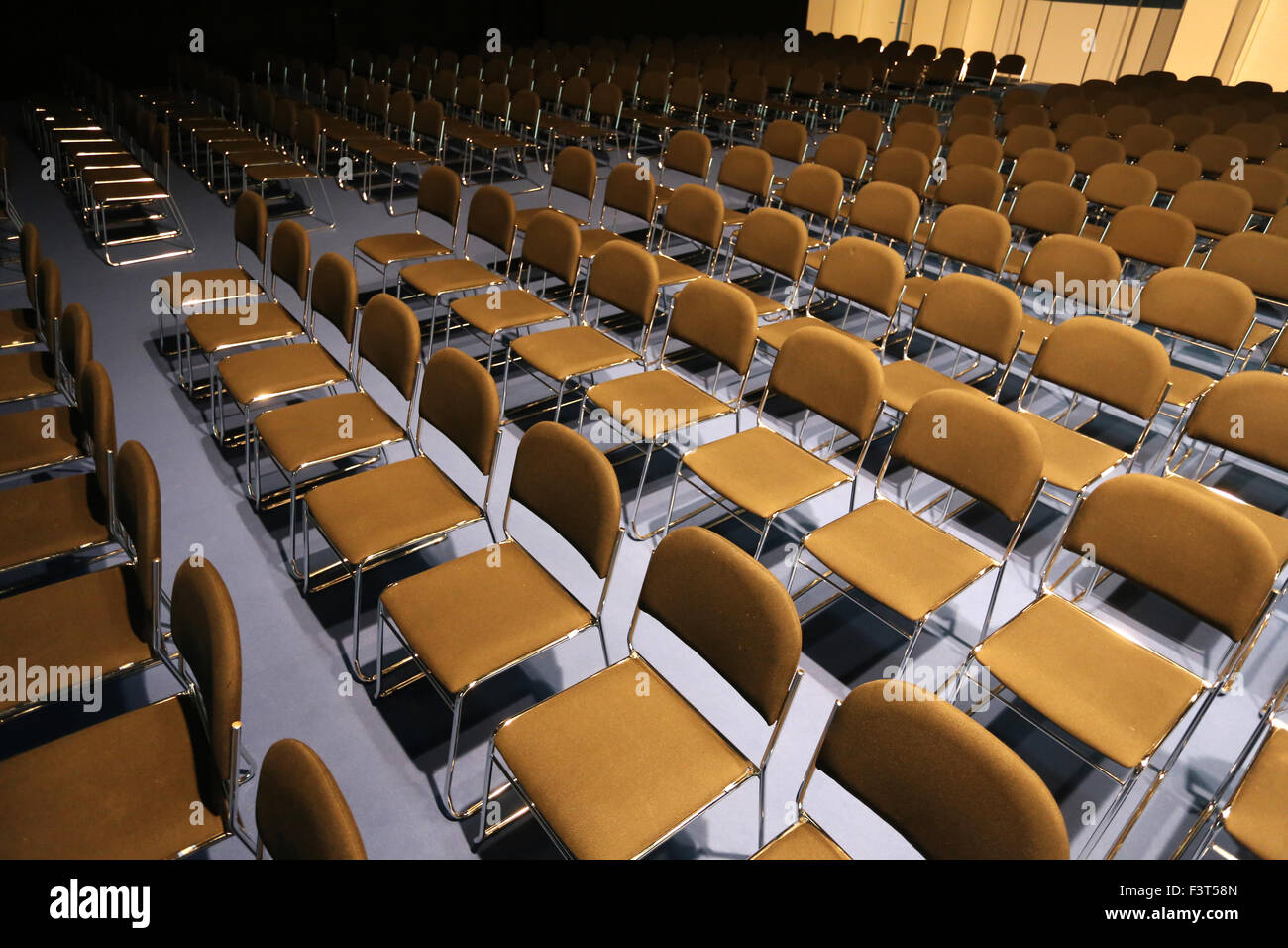 Rows of empty chairs prepared for an indoor event Stock Photo - Alamy