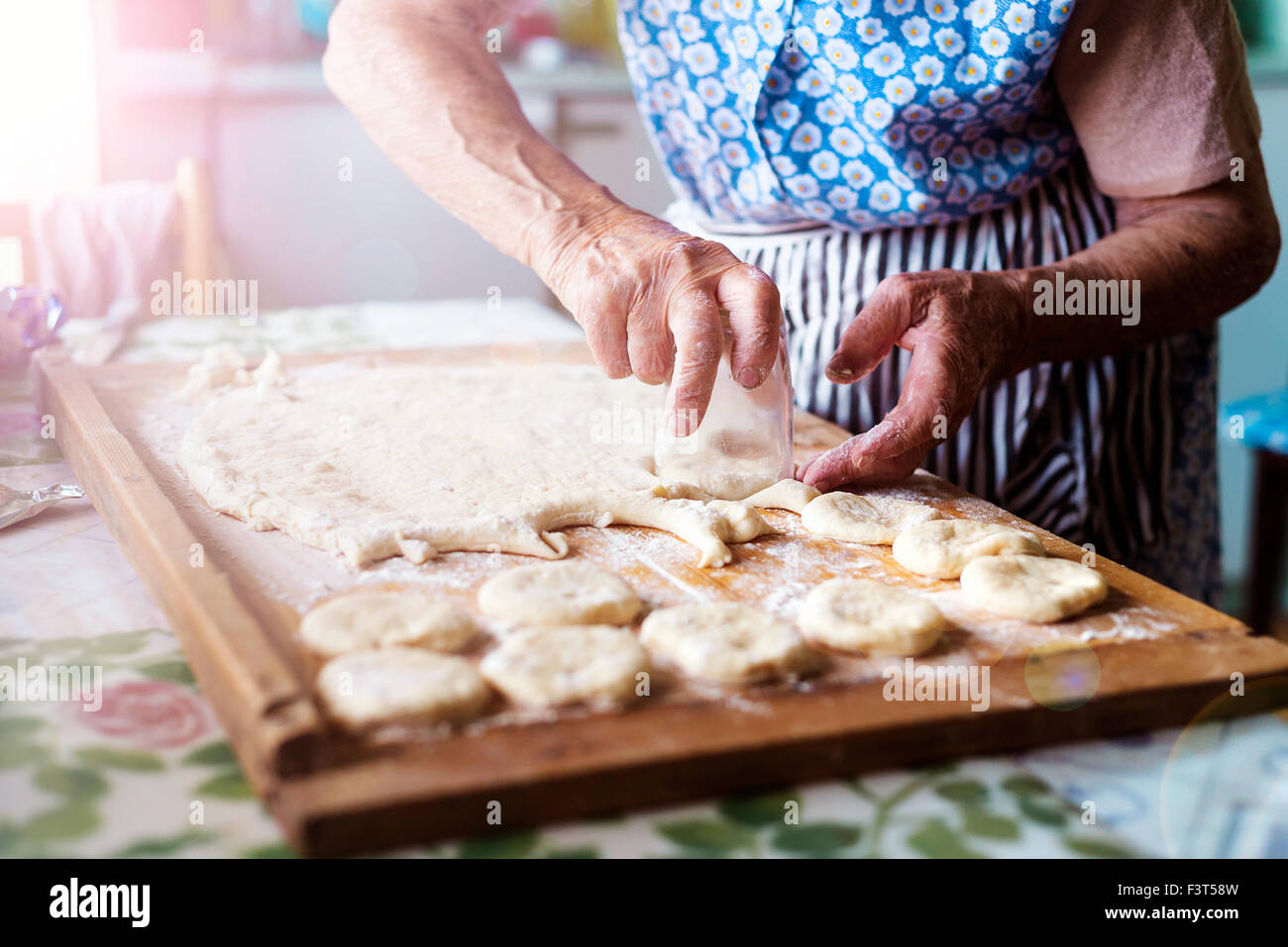 Senior woman baking Stock Photo - Alamy