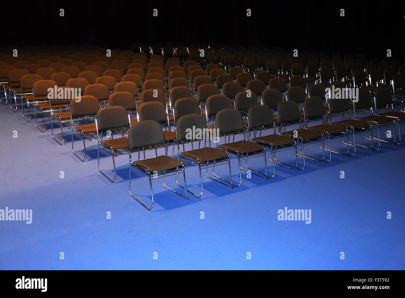 Rows of empty chairs prepared for an indoor event Stock Photo - Alamy