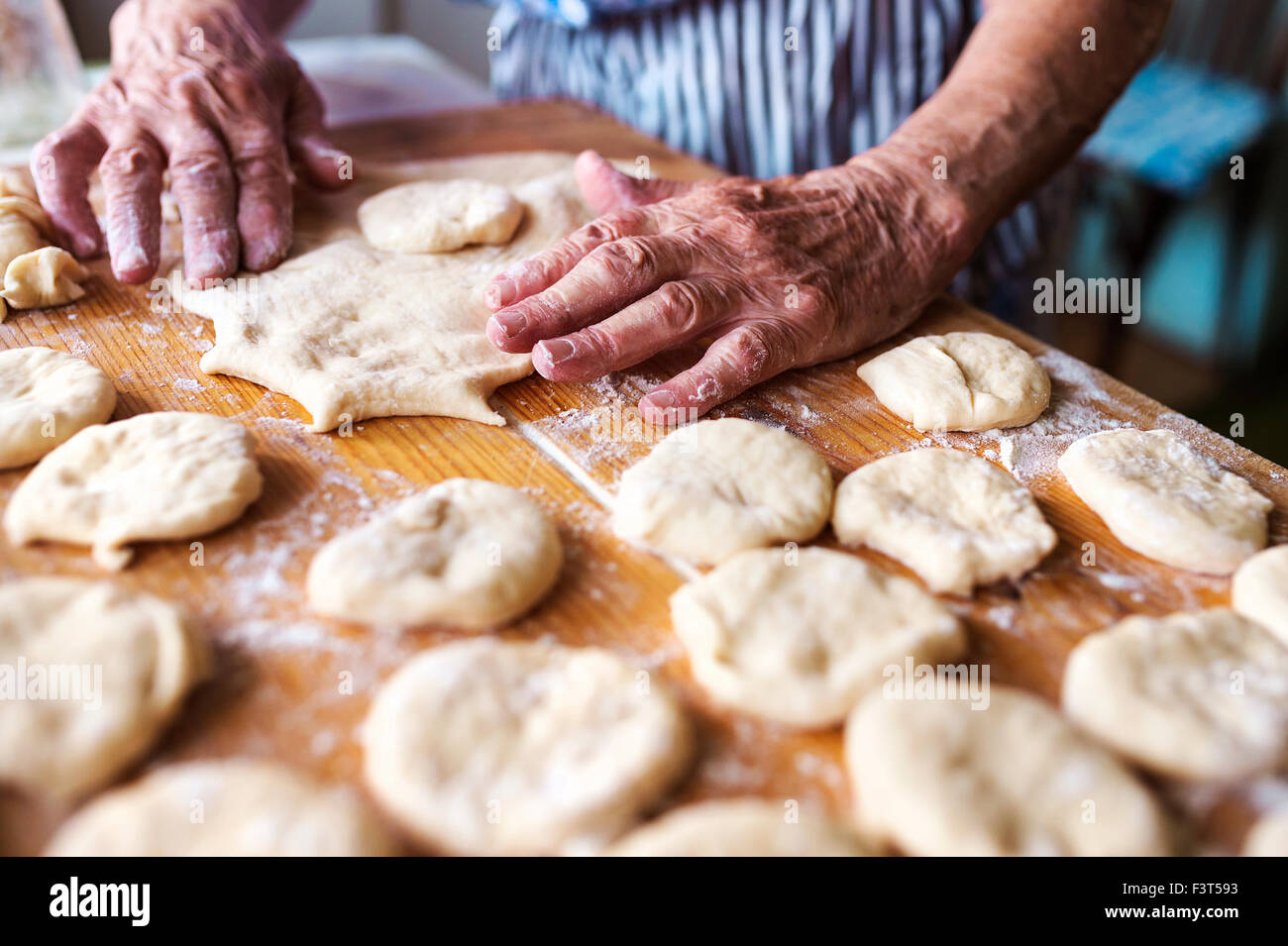 Senior woman baking Stock Photo - Alamy