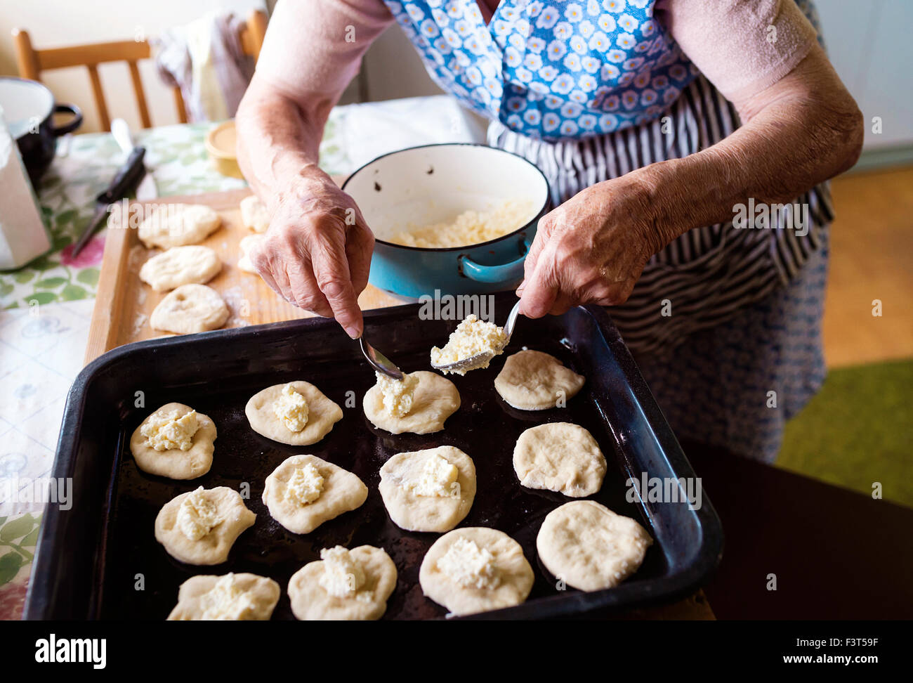Senior woman baking Stock Photo - Alamy