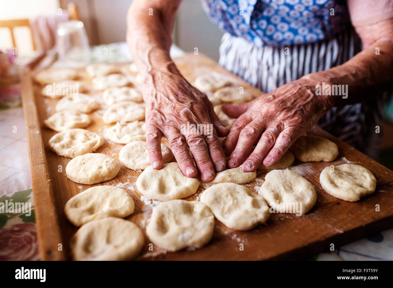 Senior woman baking Stock Photo - Alamy