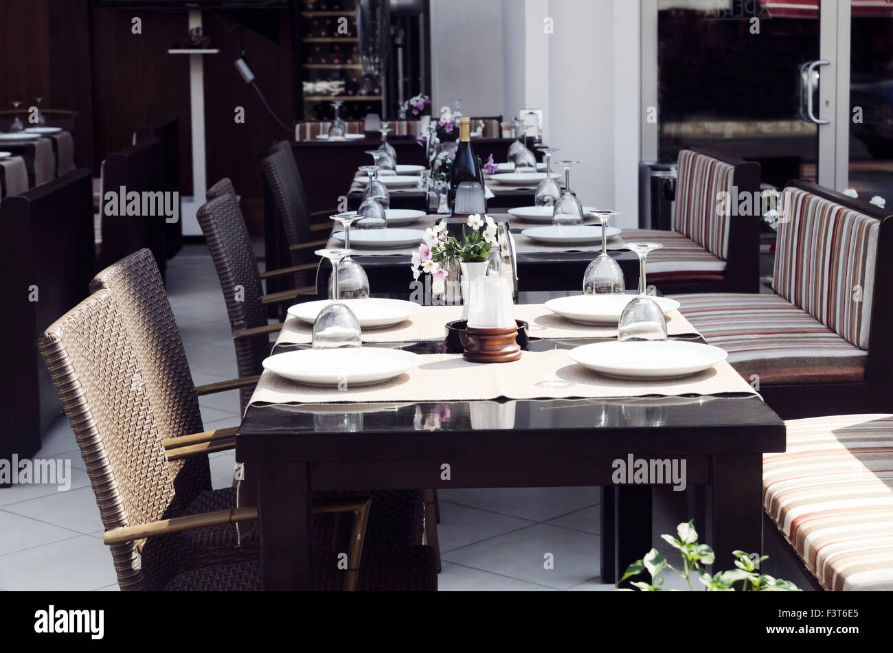 Restaurant table served for dinner Stock Photo - Alamy