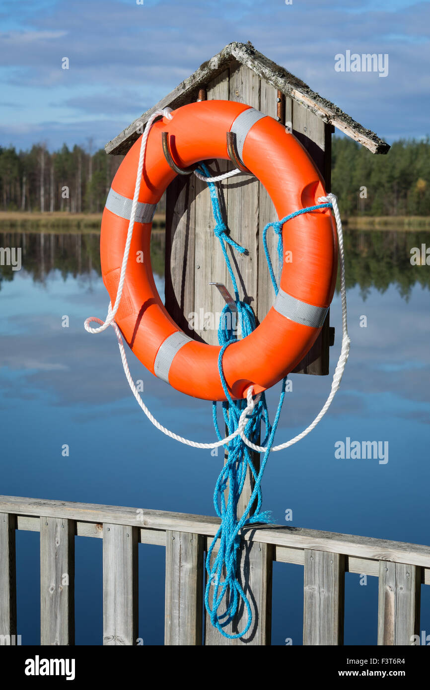 Lifebuoy at lakeside Stock Photo - Alamy