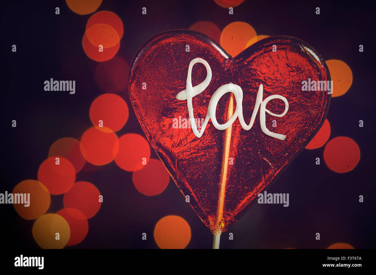 Heart shaped lollipop in retro style Stock Photo - Alamy