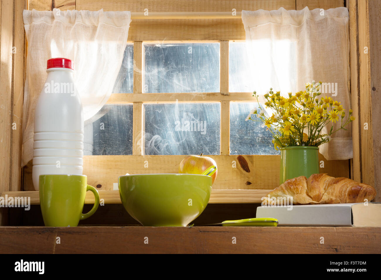 morning Breakfast with milk, croissant, and apple Stock Photo - Alamy