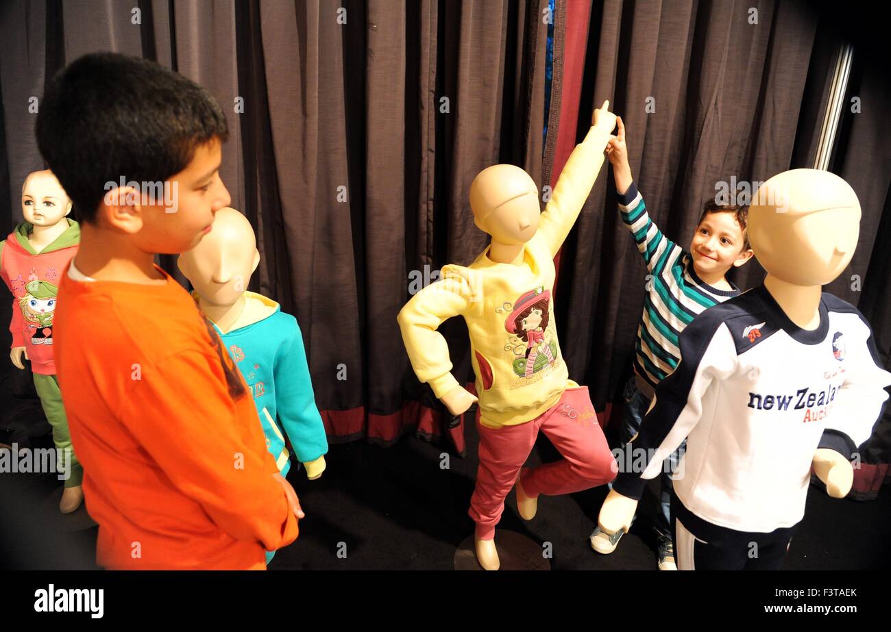 Damascus, Syria. 12th Oct, 2015. Two children play with models as they ...