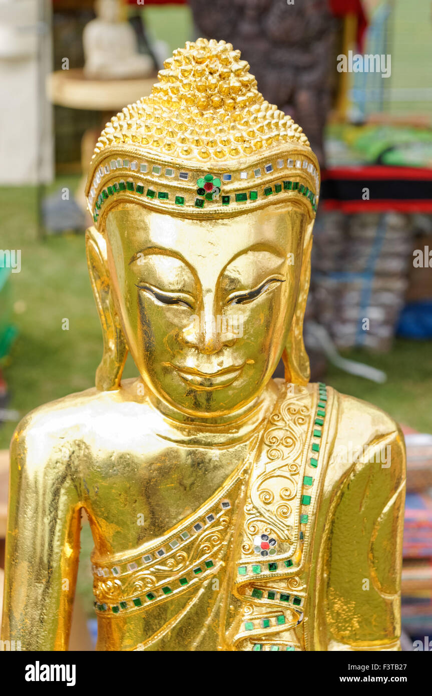 Gilded statue of buddha Stock Photo - Alamy