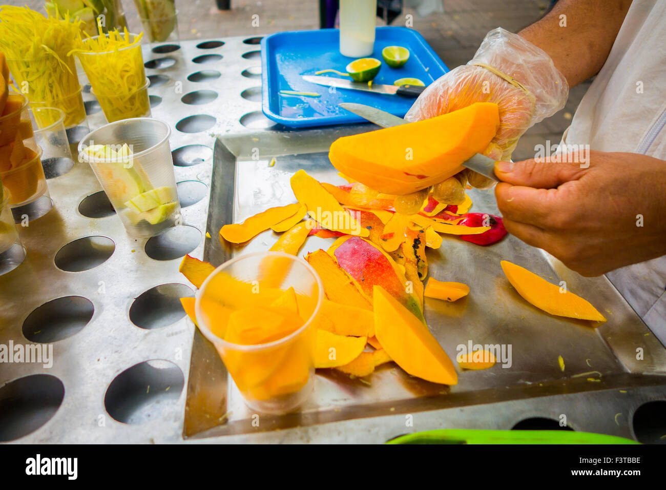 Fresh sliced mango, street food in Medellin Stock Photo - Alamy