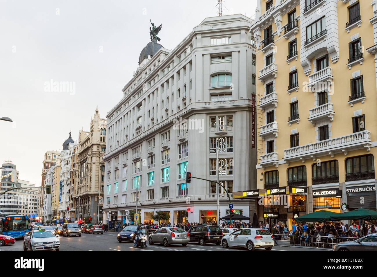 Madrid, Spain - October 10, 2015: View of stores and people in the Gran ...