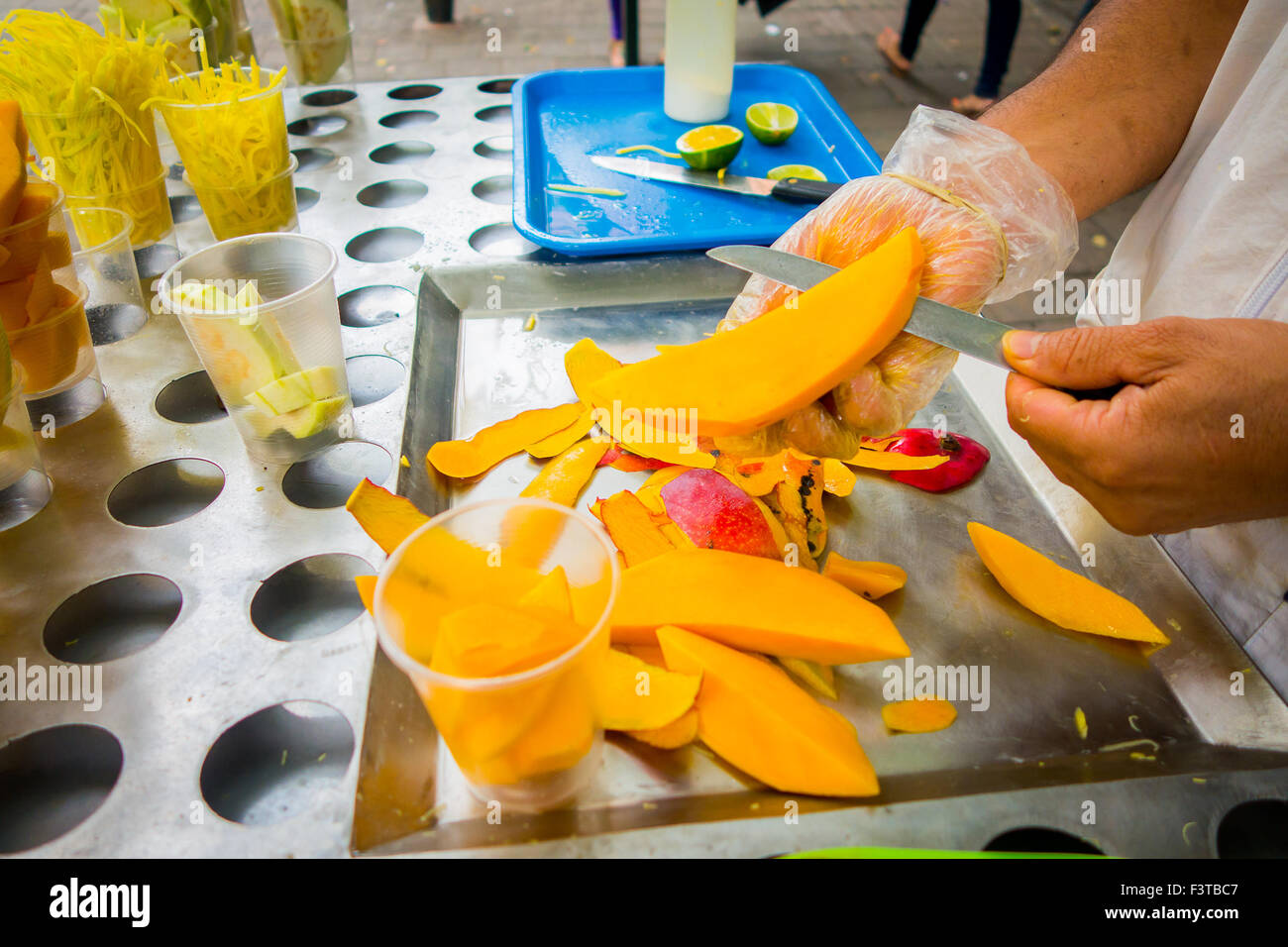 Fresh sliced mango, street food in Medellin Stock Photo - Alamy
