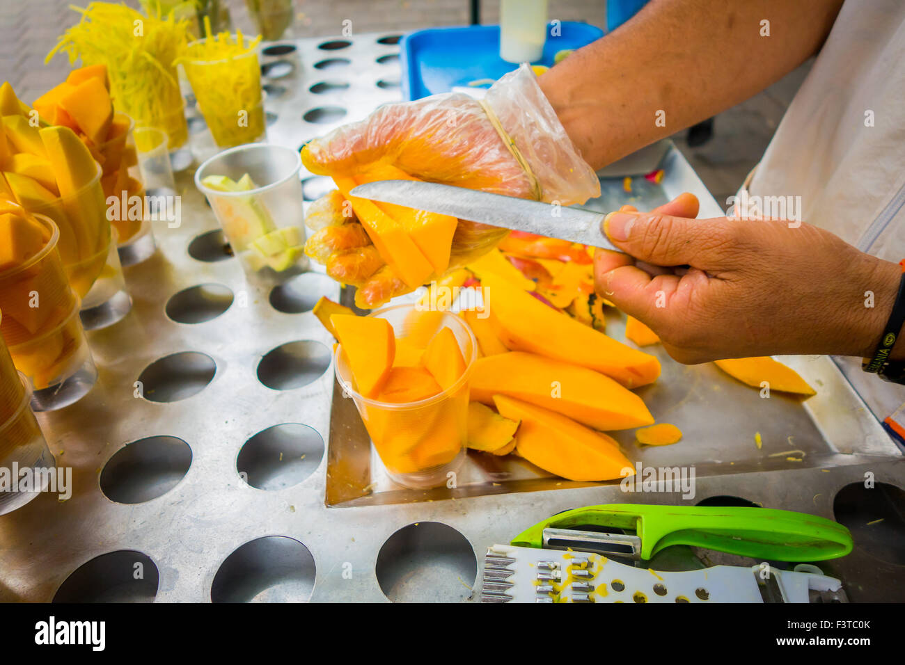 Fresh sliced mango, street food in Medellin Stock Photo - Alamy