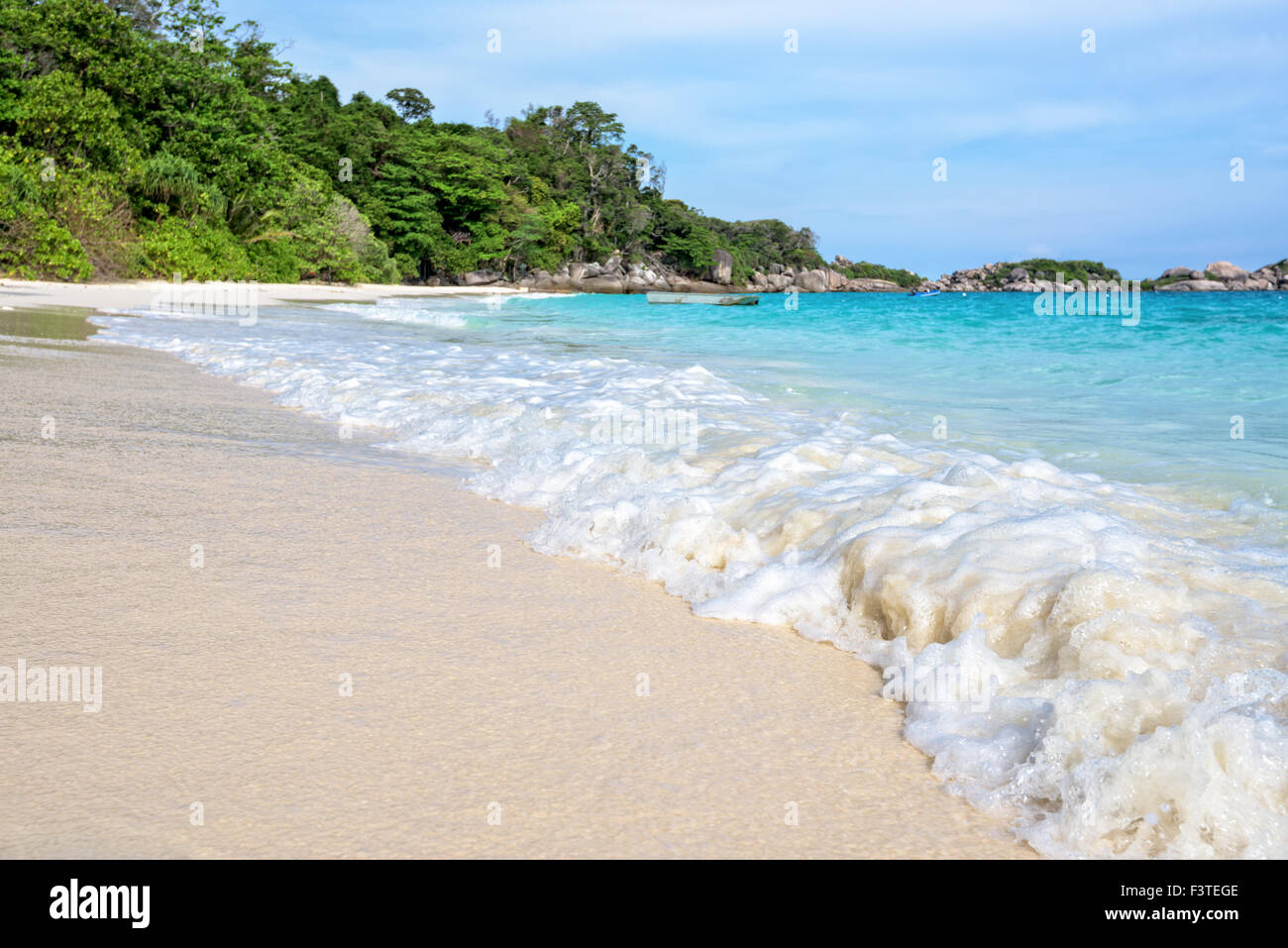 Beautiful nature of blue sea sand and white waves on the beach during ...